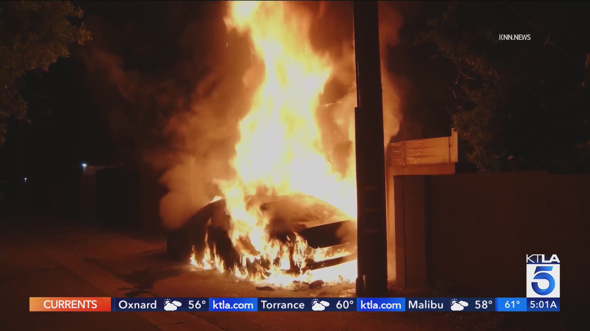 EV goes up in flames, scorches building in Granada Hills – KTLA