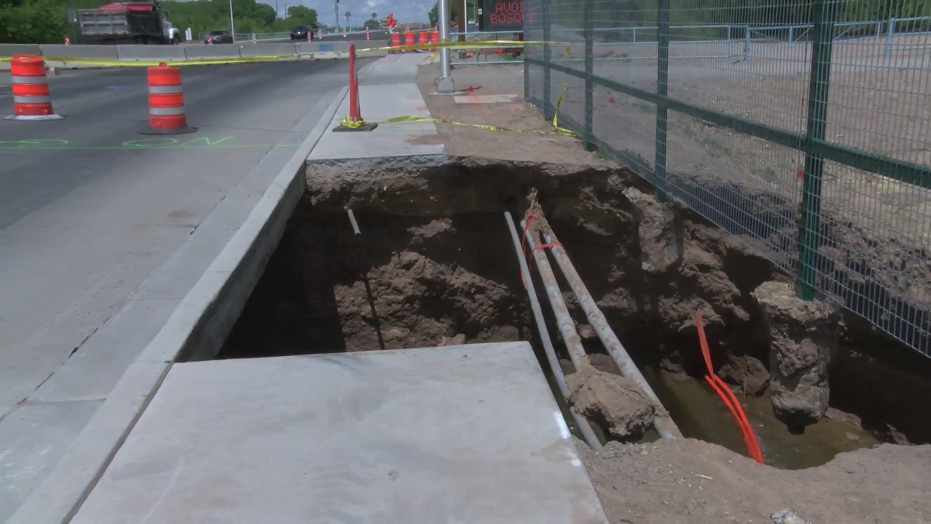 Sinkhole takes out sidewalk off of Los Lunas main street bridge ...