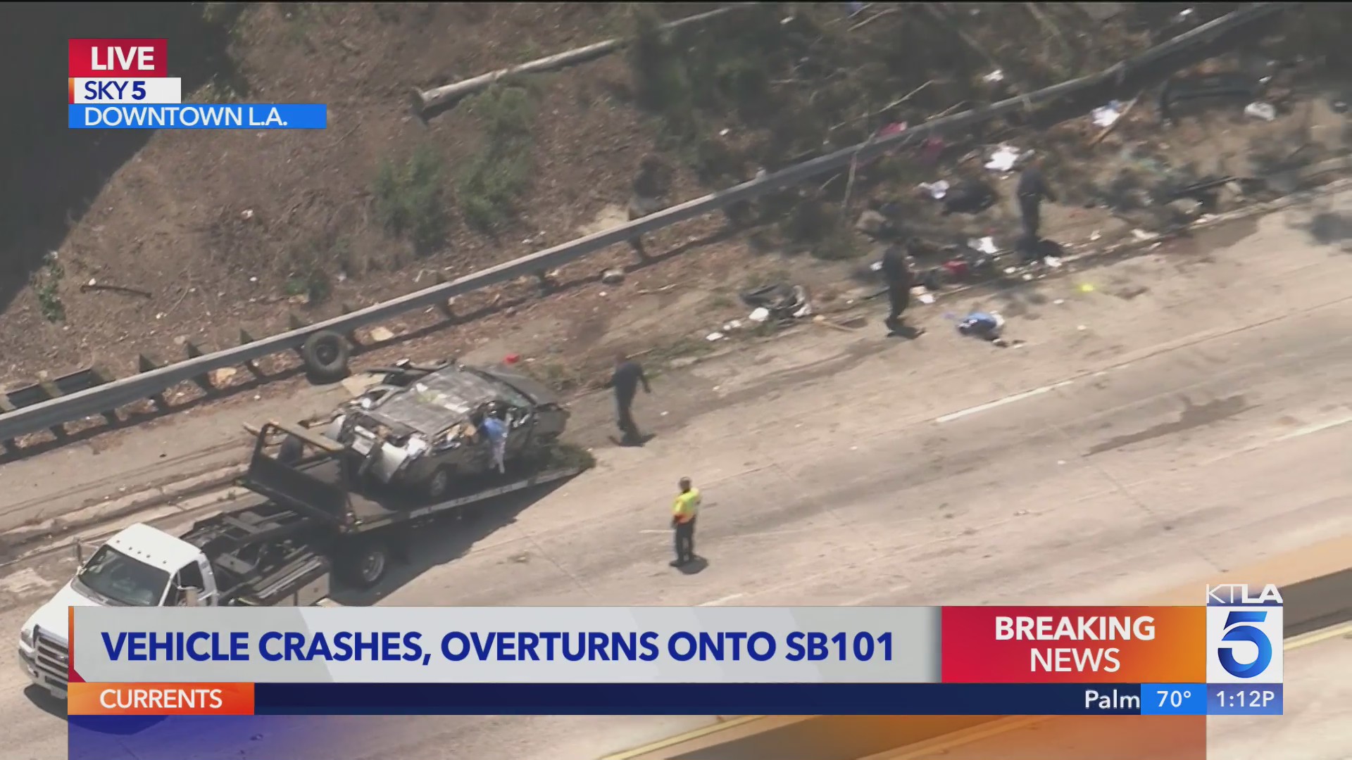 2 in ‘at least serious condition’ after car flies off freeway ...