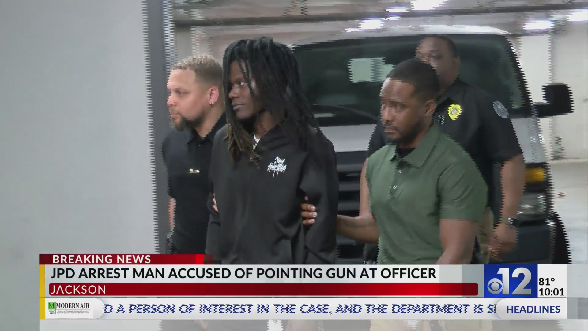 Jackson police arrest man accused of pointing gun at officer in patrol ...