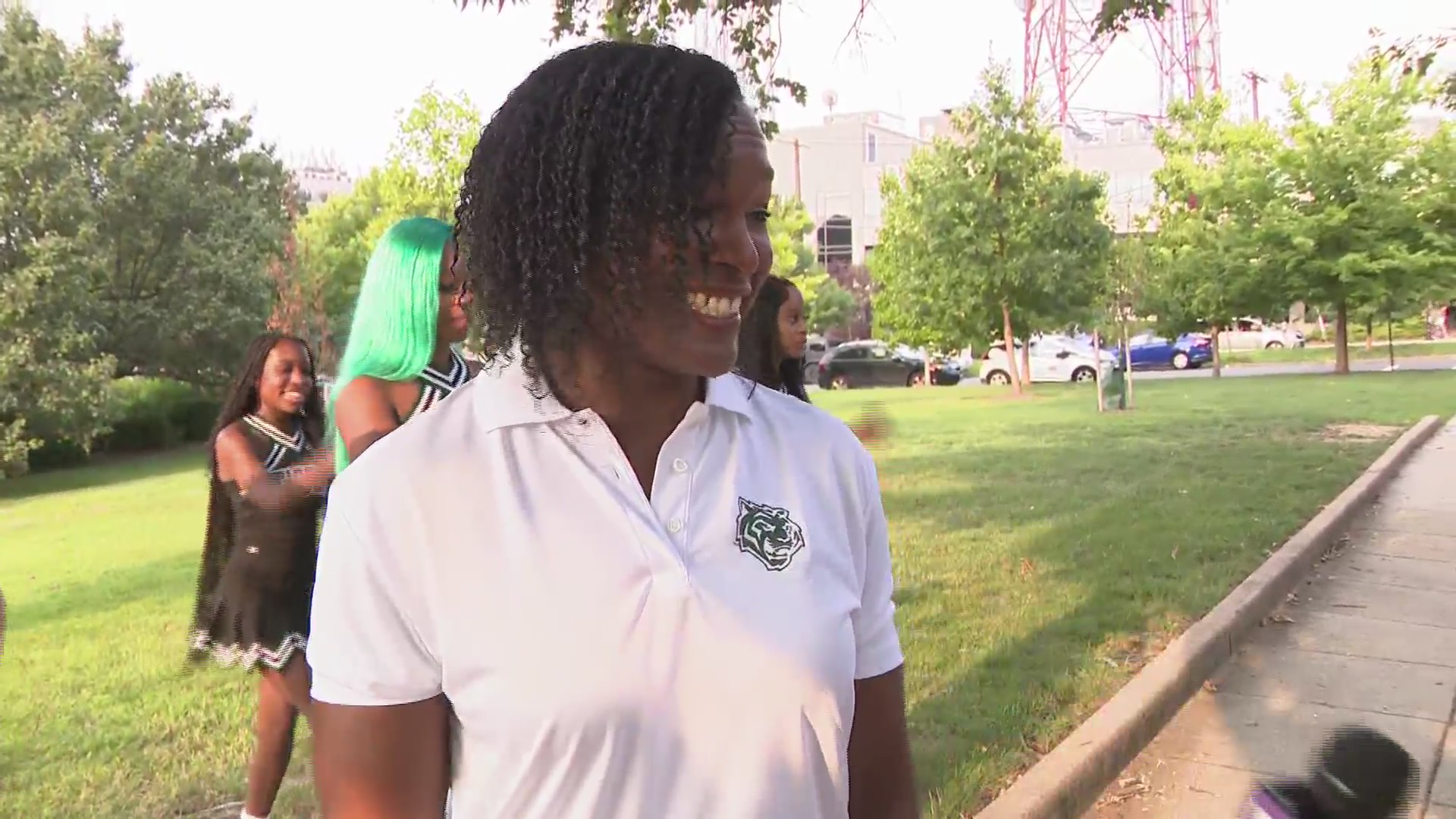 Cheerleaders, mascot kick off first day of school at Jackson-Reed High ...