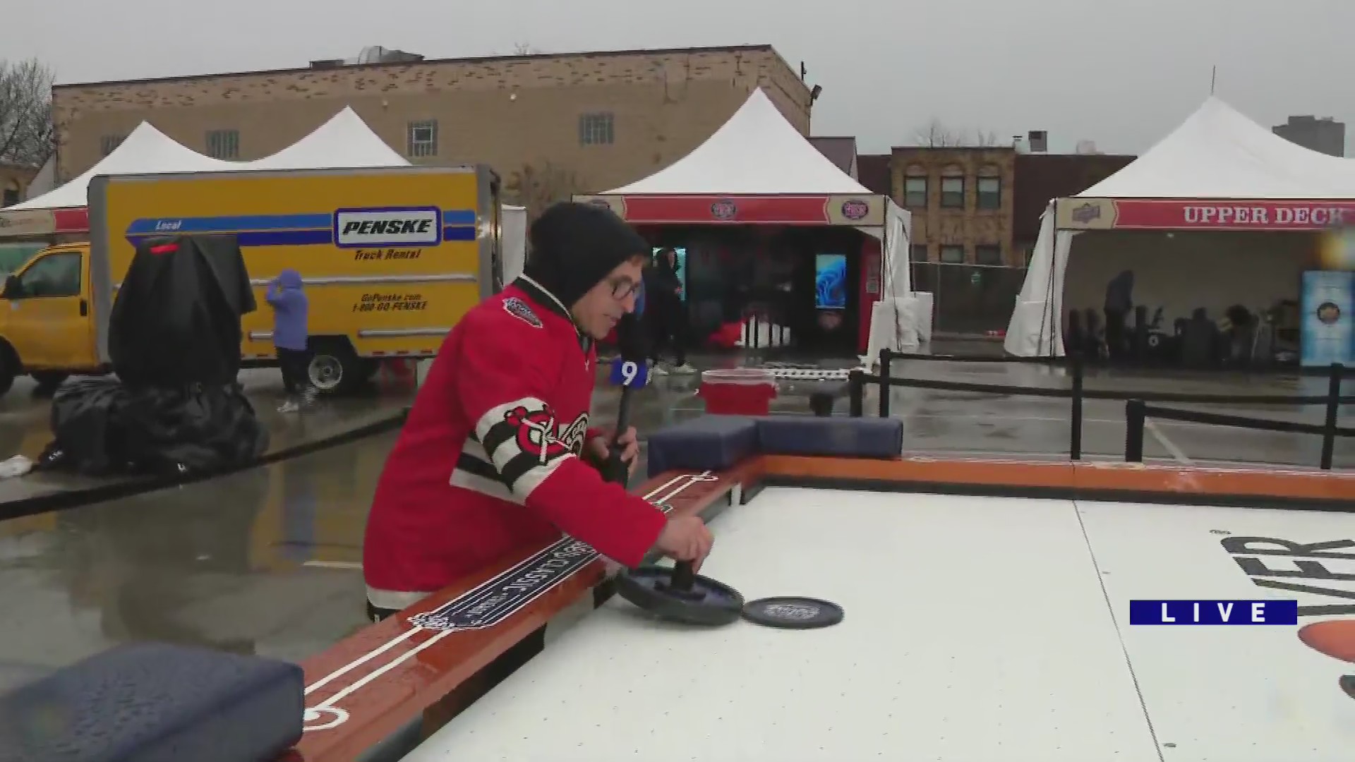 WGN’s Erik Runge tries his hand at giant air hockey inside the NHL ...