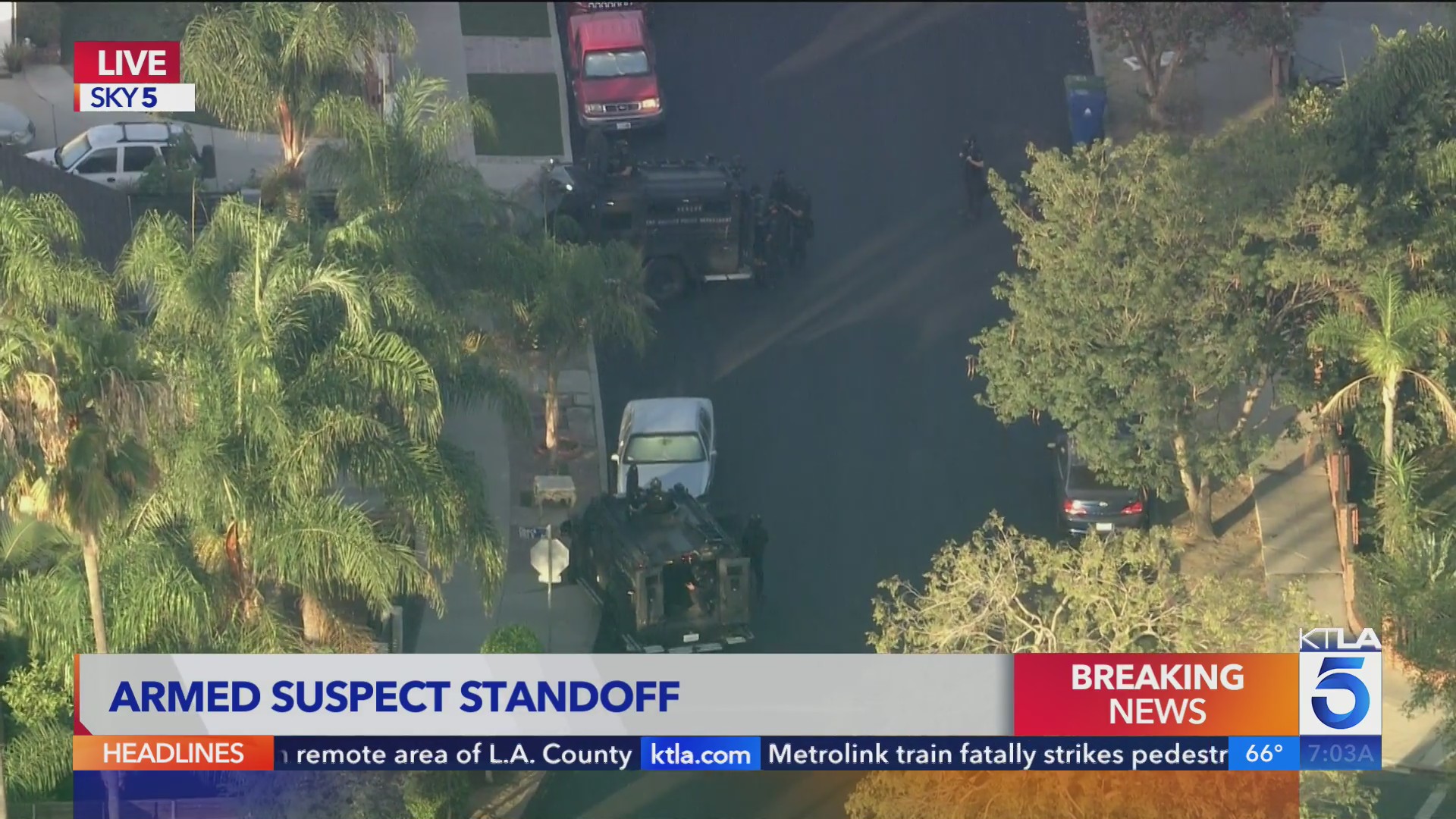 Police officers, SWAT team engaged in standoff with armed man at L.A ...