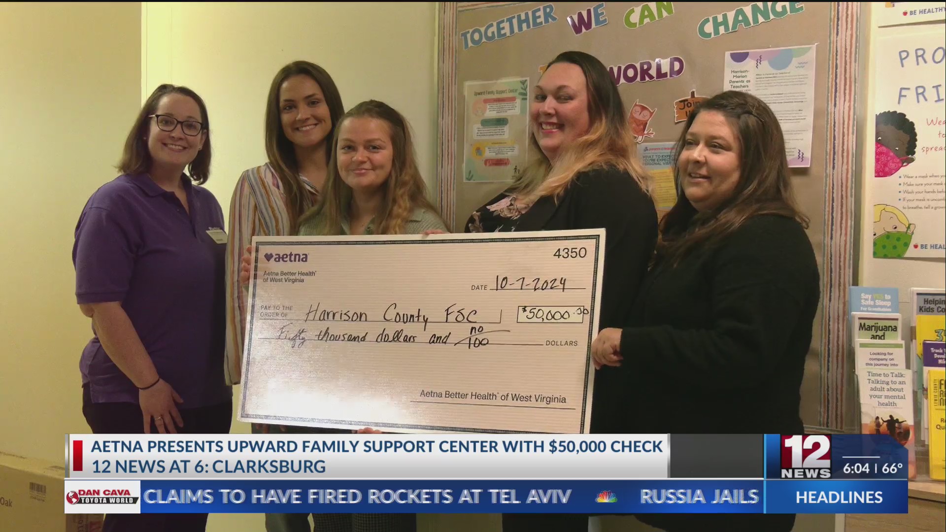 Aetna presents check to Clarksburg’s Upward Family Support Center ...