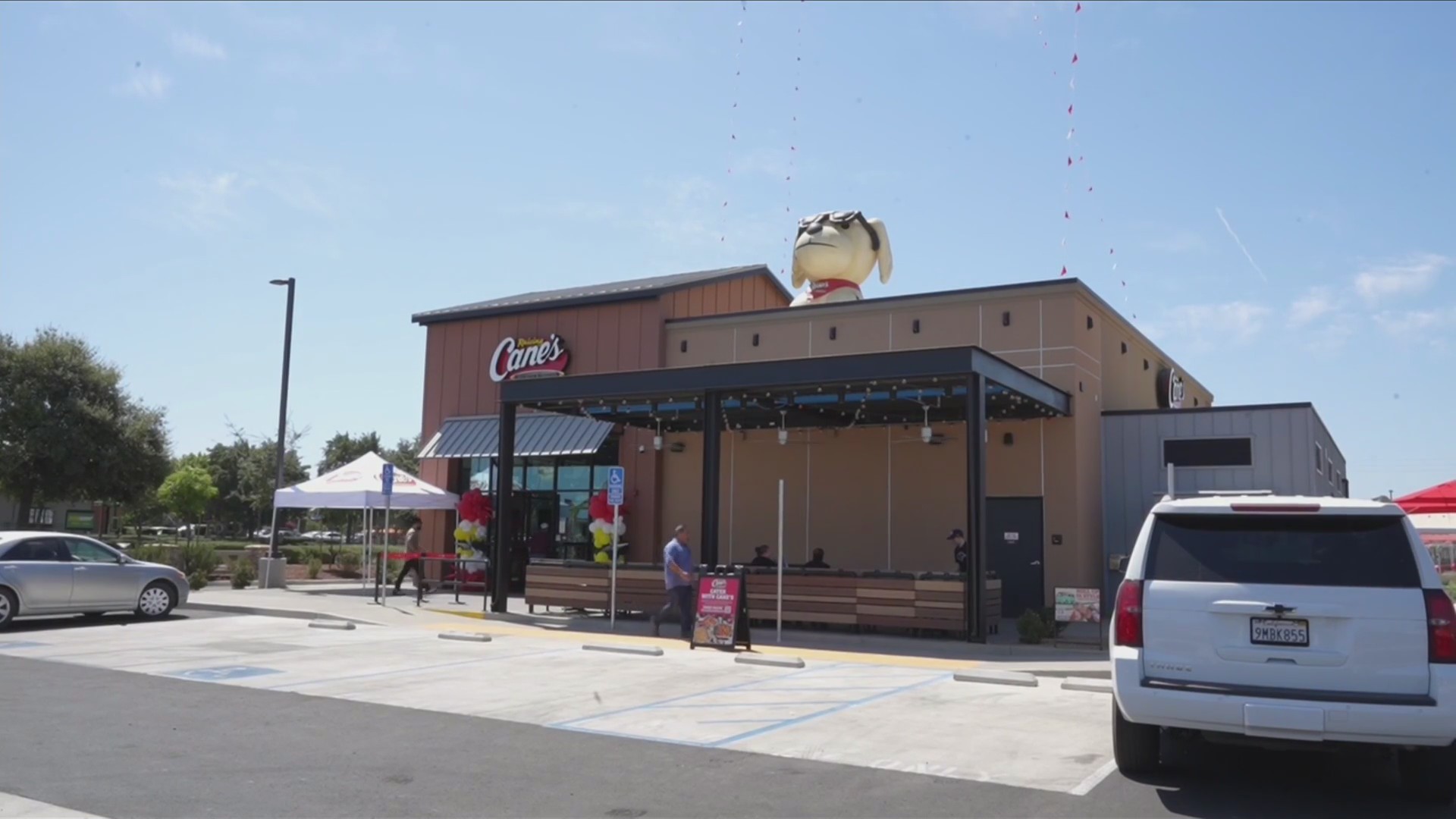 Win a full year of free chicken at new Raising Canes grand opening in ...