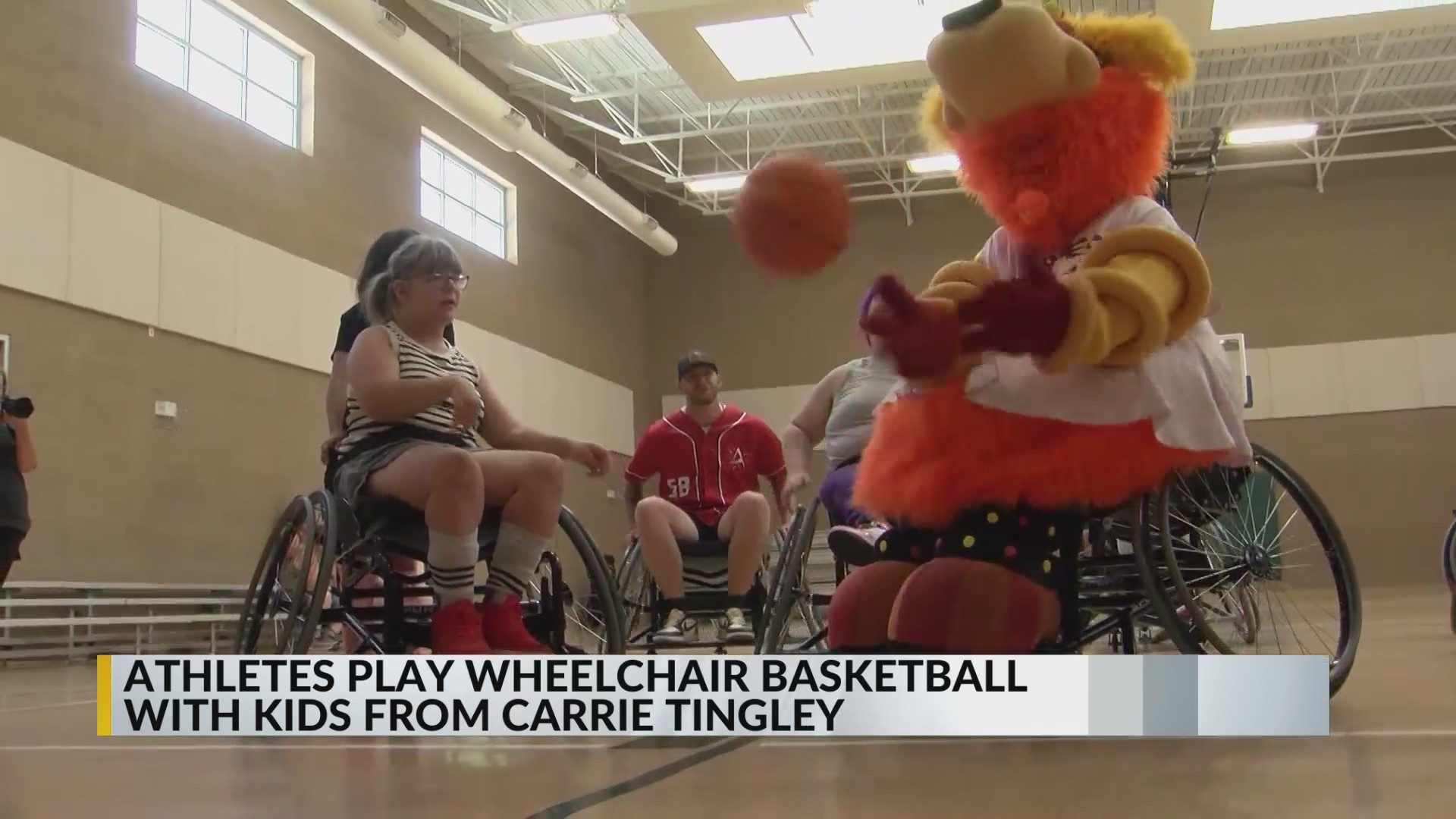Isotopes play wheelchair basketball supporting Carrie Tingley – KRQE ...