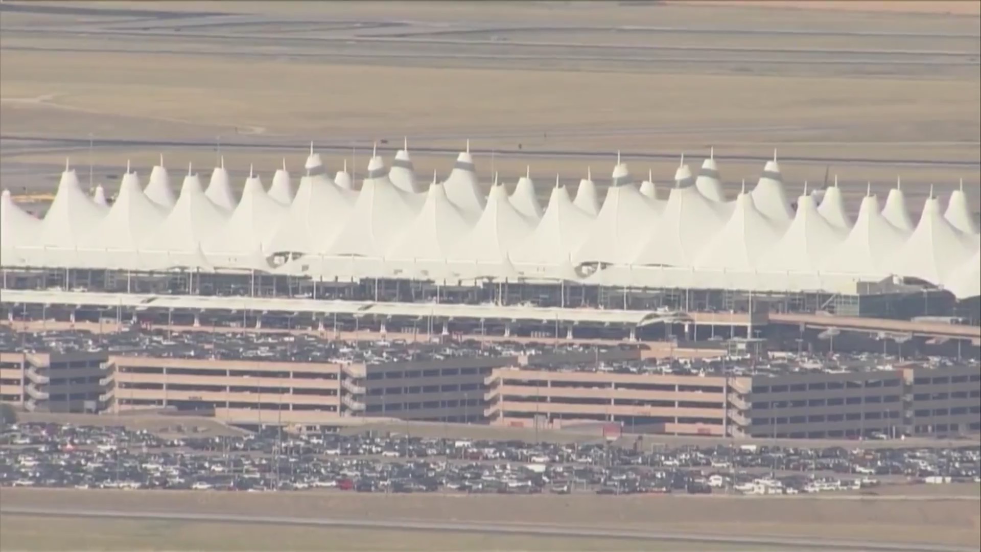 Passengers, witnesses recall flight in flames that emergency landed in ...