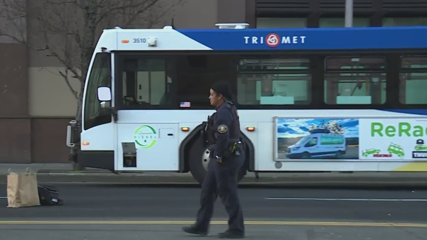Man in custody after barricading himself in TriMet bus after firing ...