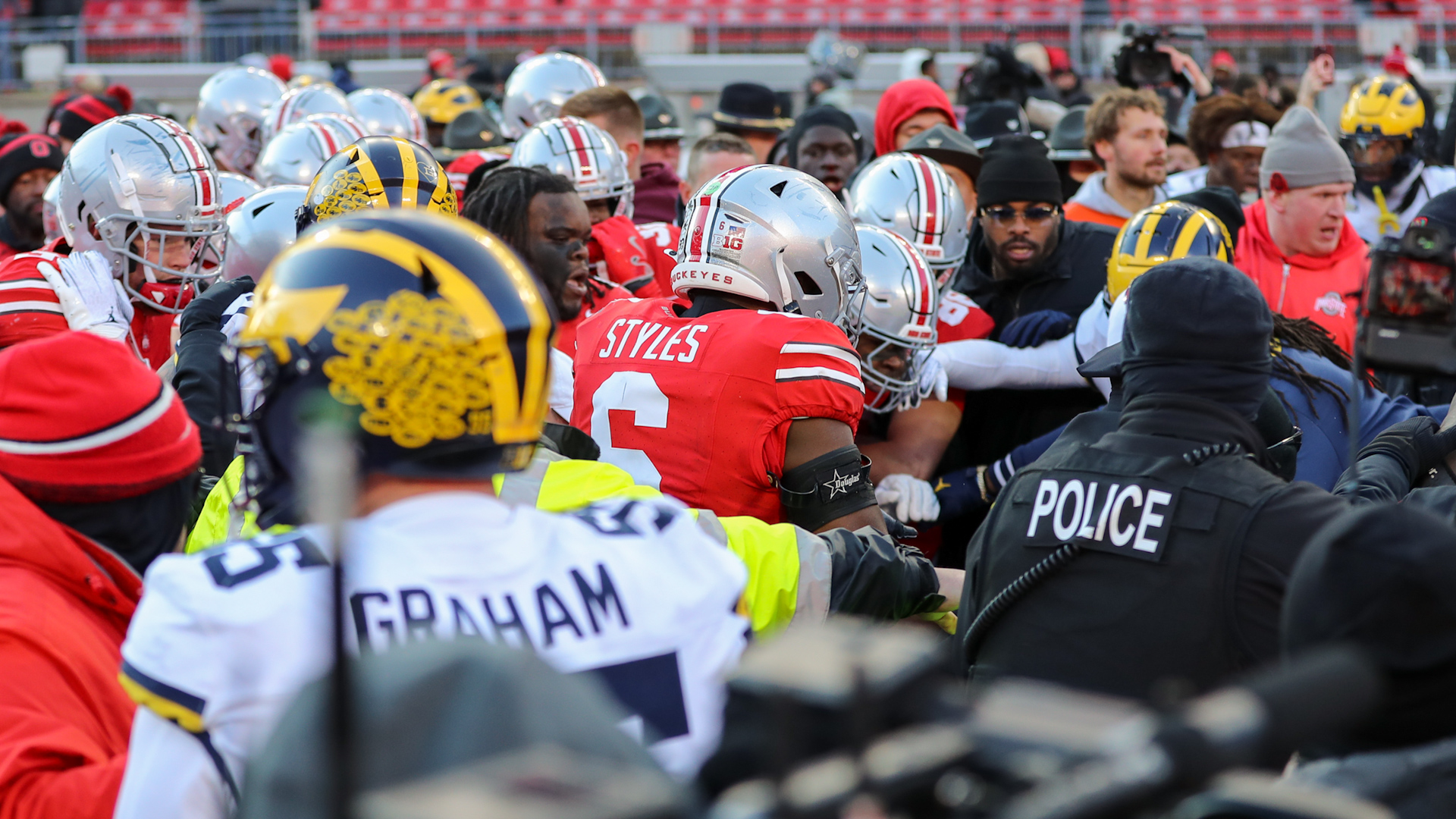 Michigan, Ohio State fight broken up with police pepper spray after ...