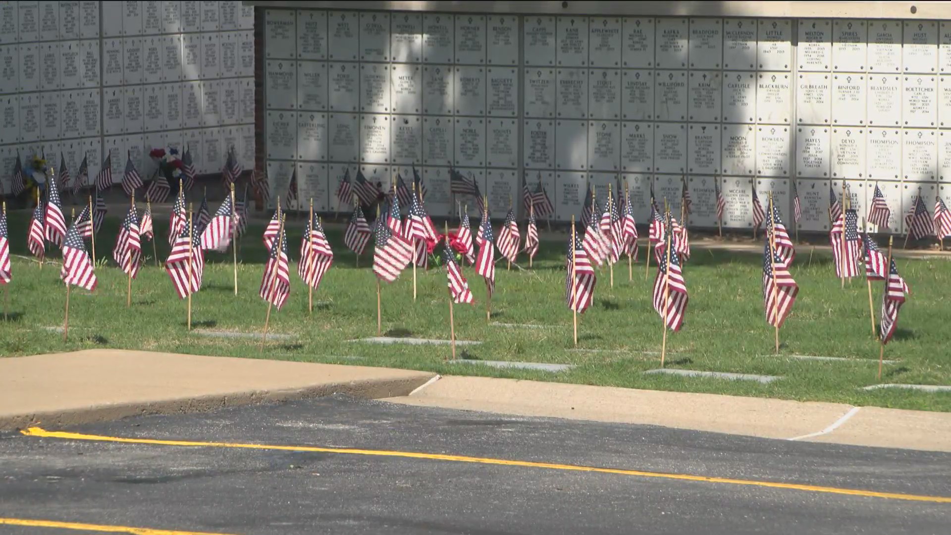 Flags put at each headstone at Fayetteville National Cemetary for ...