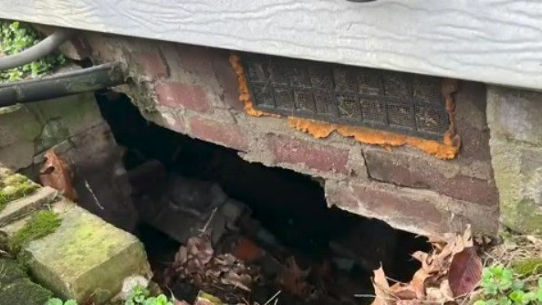 Couple evacuates after storms cause basement wall to collapse ...