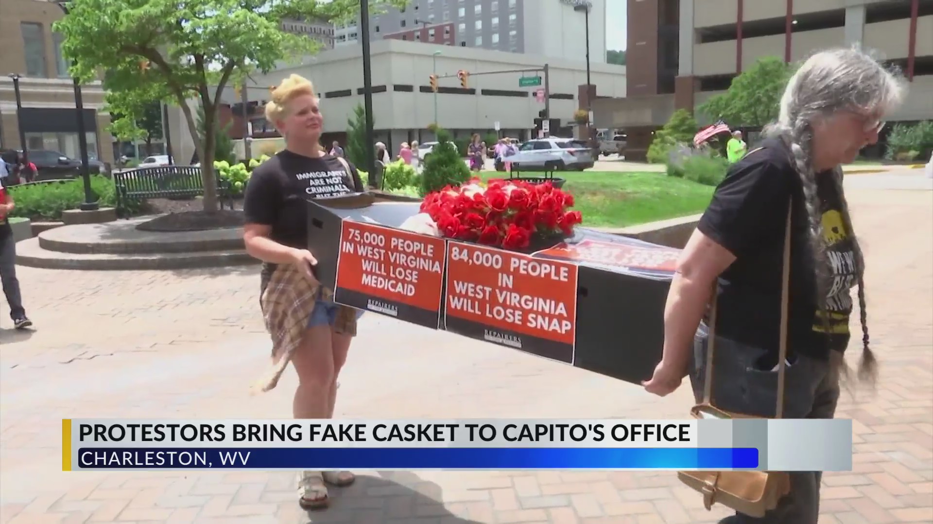 Protesters bring fake casket to Sen. Capito’s office – WOWK 13 News
