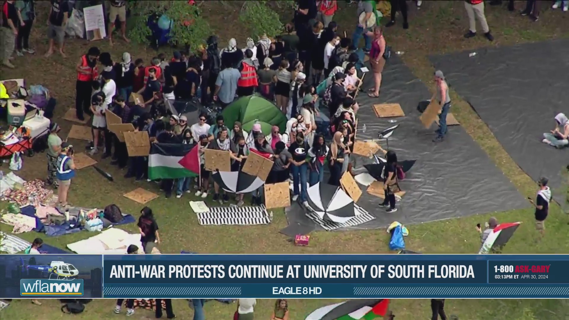 Pro-Palestine students line up with umbrella shields at USF protest – WFLA