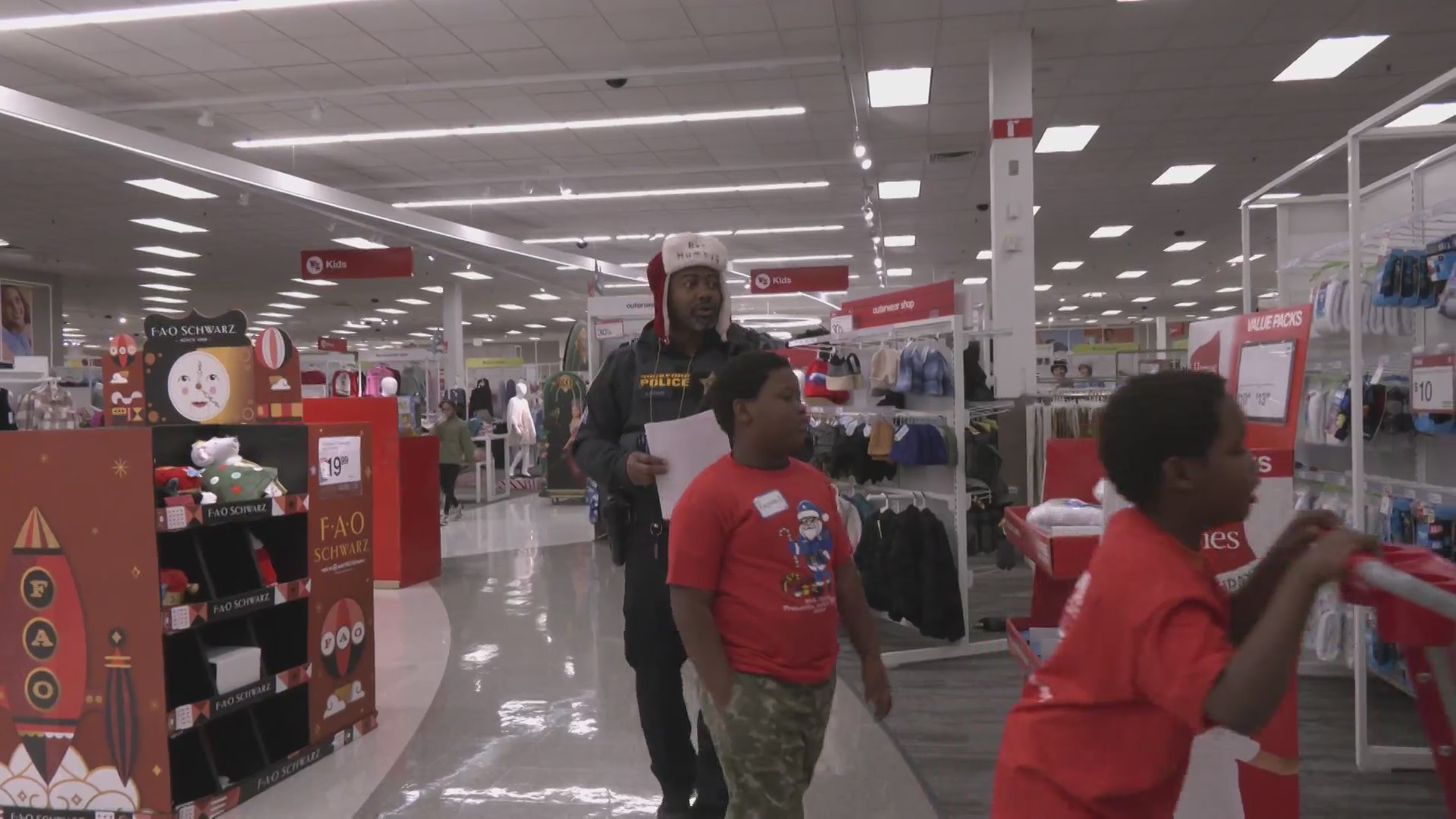 RPD builds community connection by holiday shopping with RPS students ...