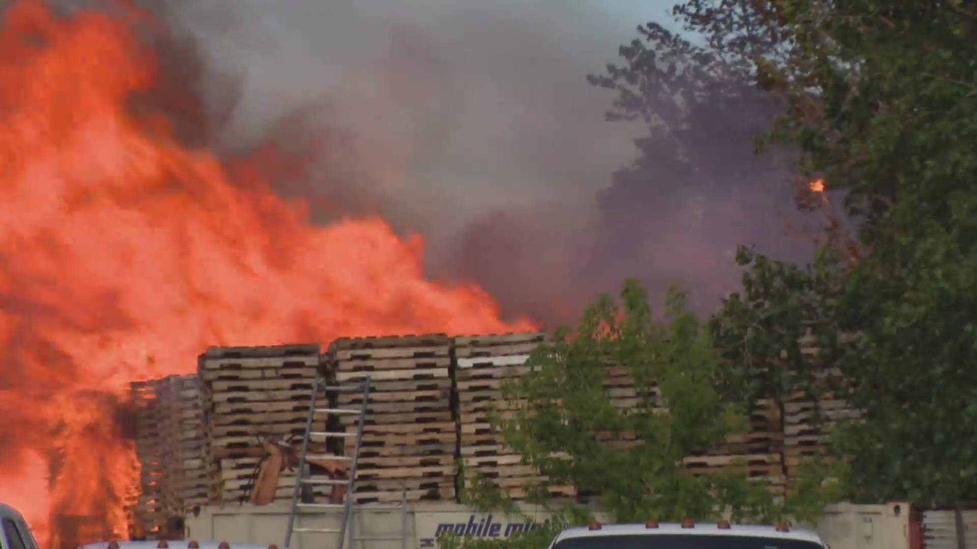 Massive fire destroys pallet warehouse in West Town, smoke seen in some ...