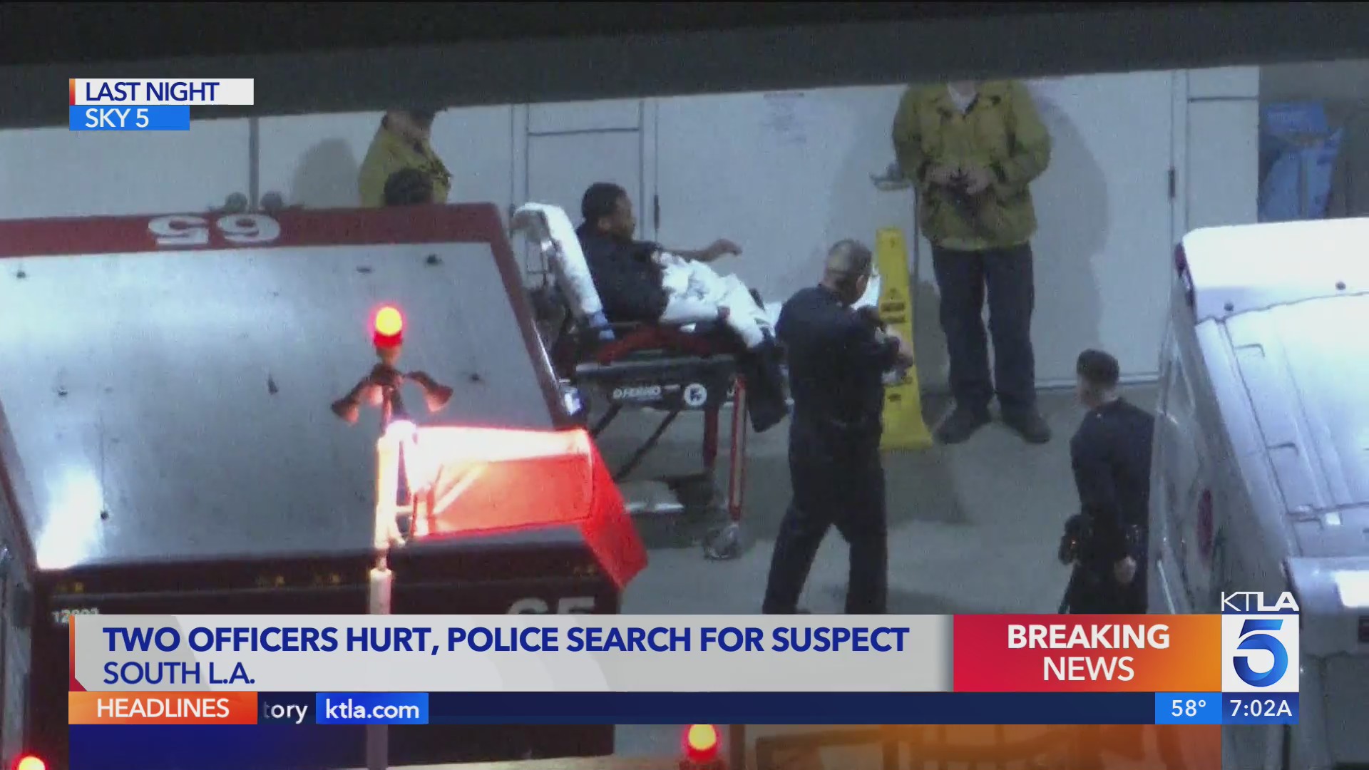 Suspect in custody after LAPD officers shot during robbery in South Los ...