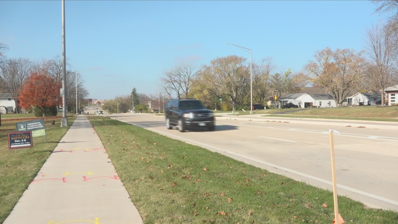 City officials celebrate the completion of a major Peoria road project ...