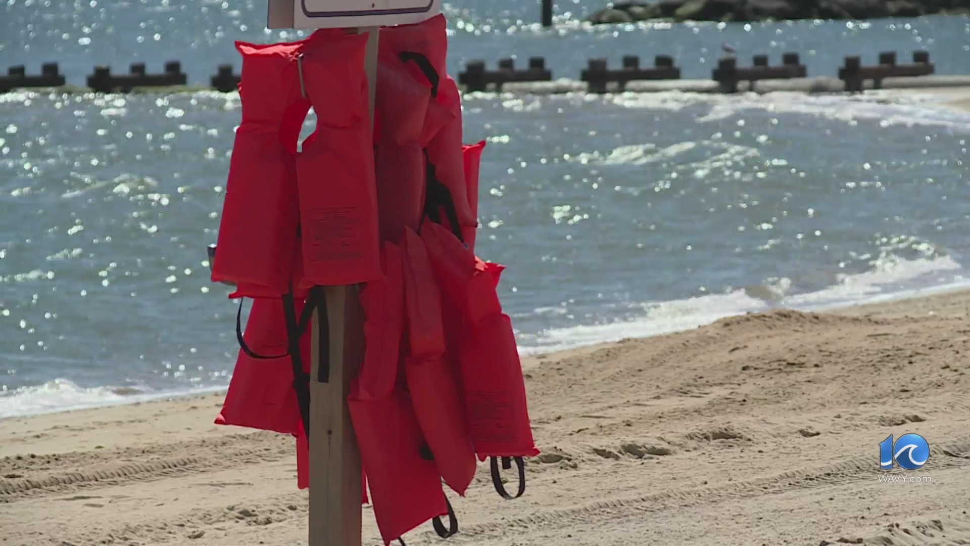 Crews tackle trash and water risks ahead of beach crowds in Norfolk ...