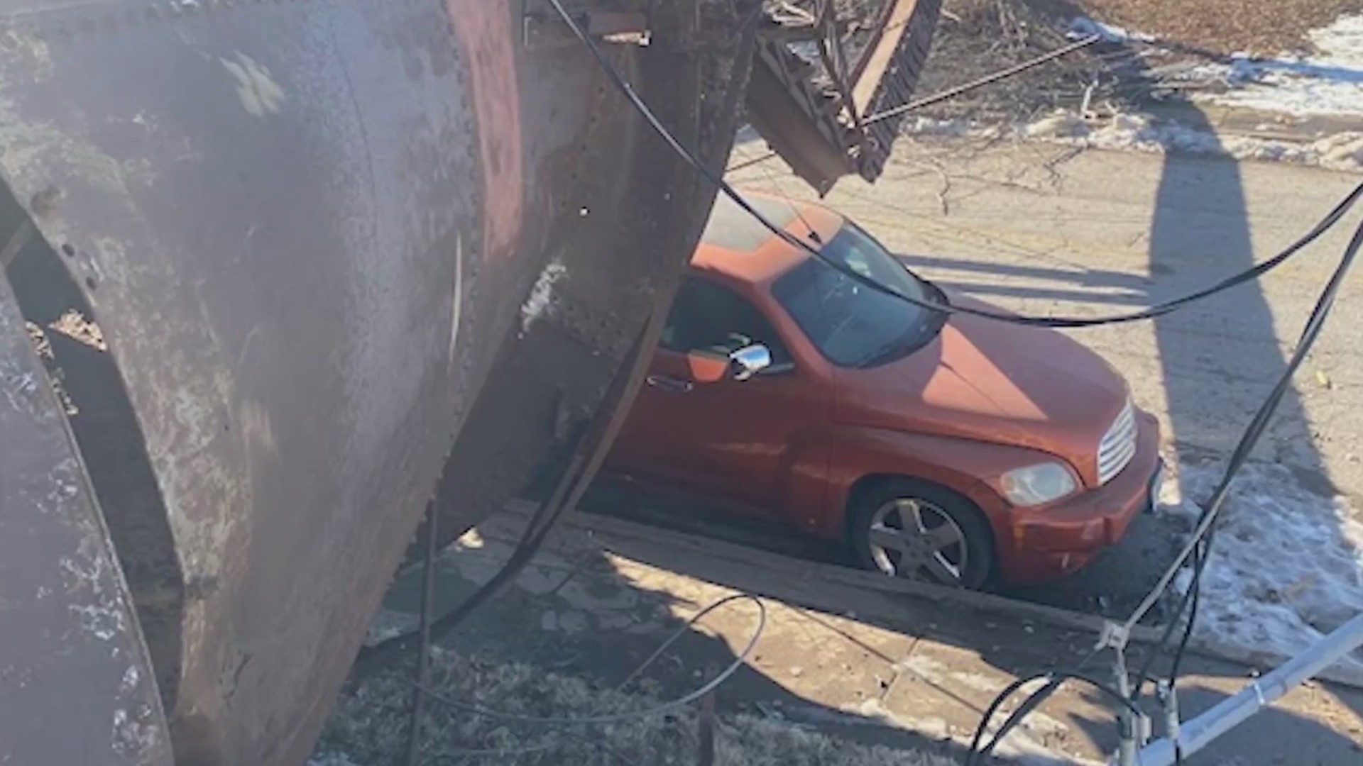Water tower falls the wrong way during demolition into woman’s yard ...