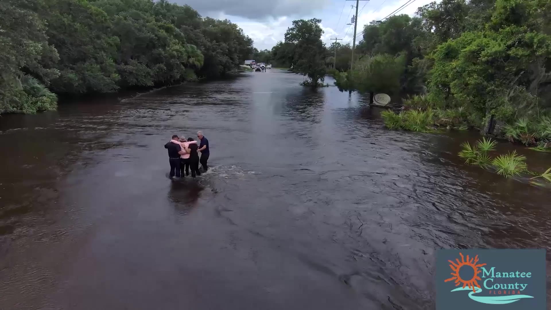 WATCH: Woman rescued from car in Manatee County flooding by officials ...