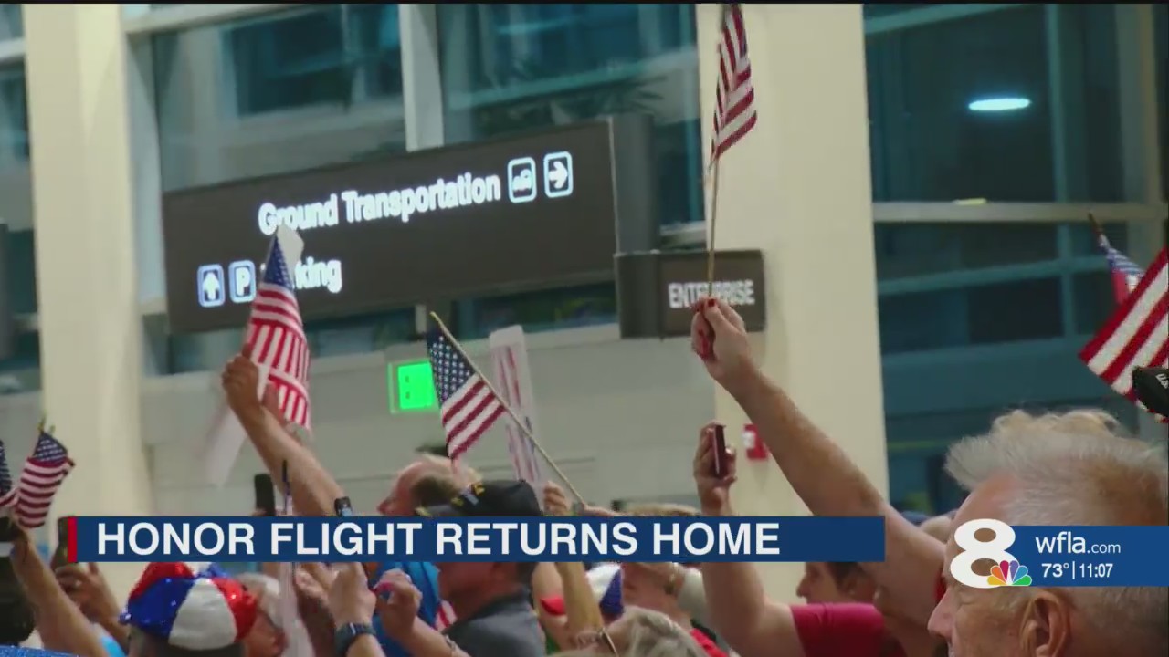 Dozens of veterans receive patriotic welcome-home following honor ...