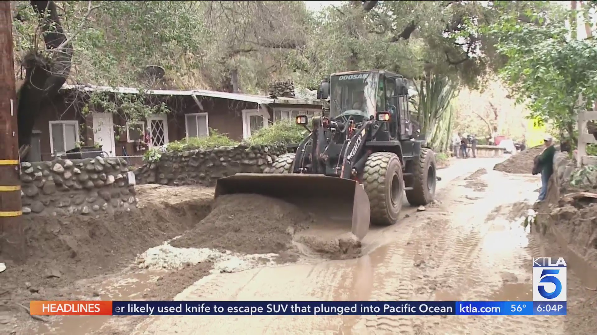 Crews work to clean up after SoCal storm floods roads, leaves muddy ...
