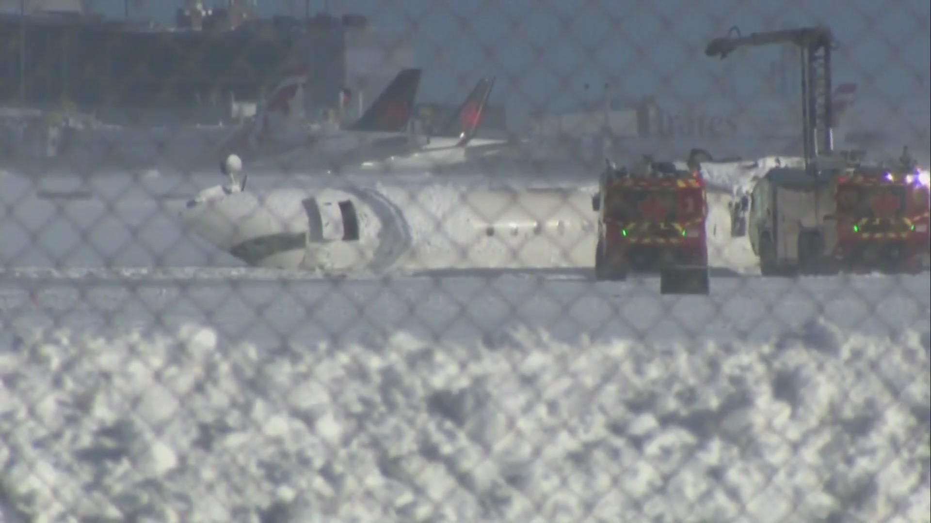 Child among 17 hurt after Delta flight flips while landing at Toronto ...