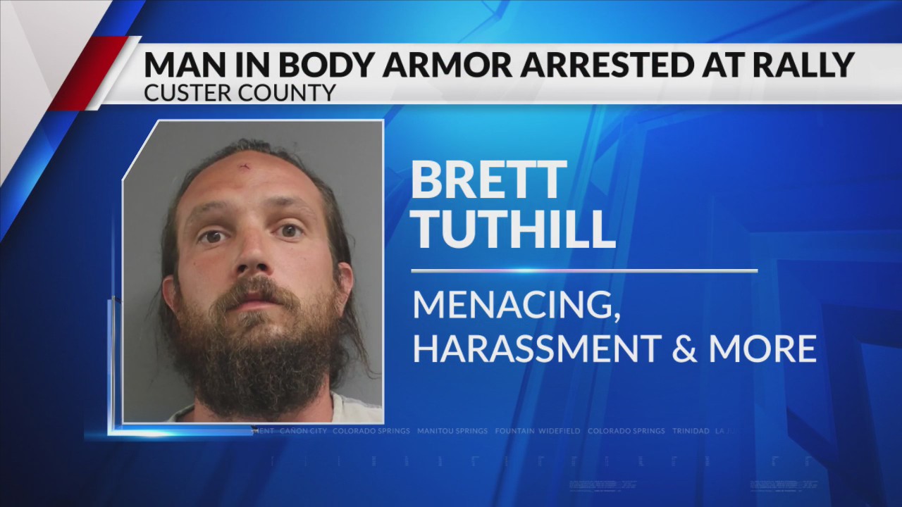CCSO: Man in body armor arrested, pointed gun at Flag Day rally – FOX21 ...