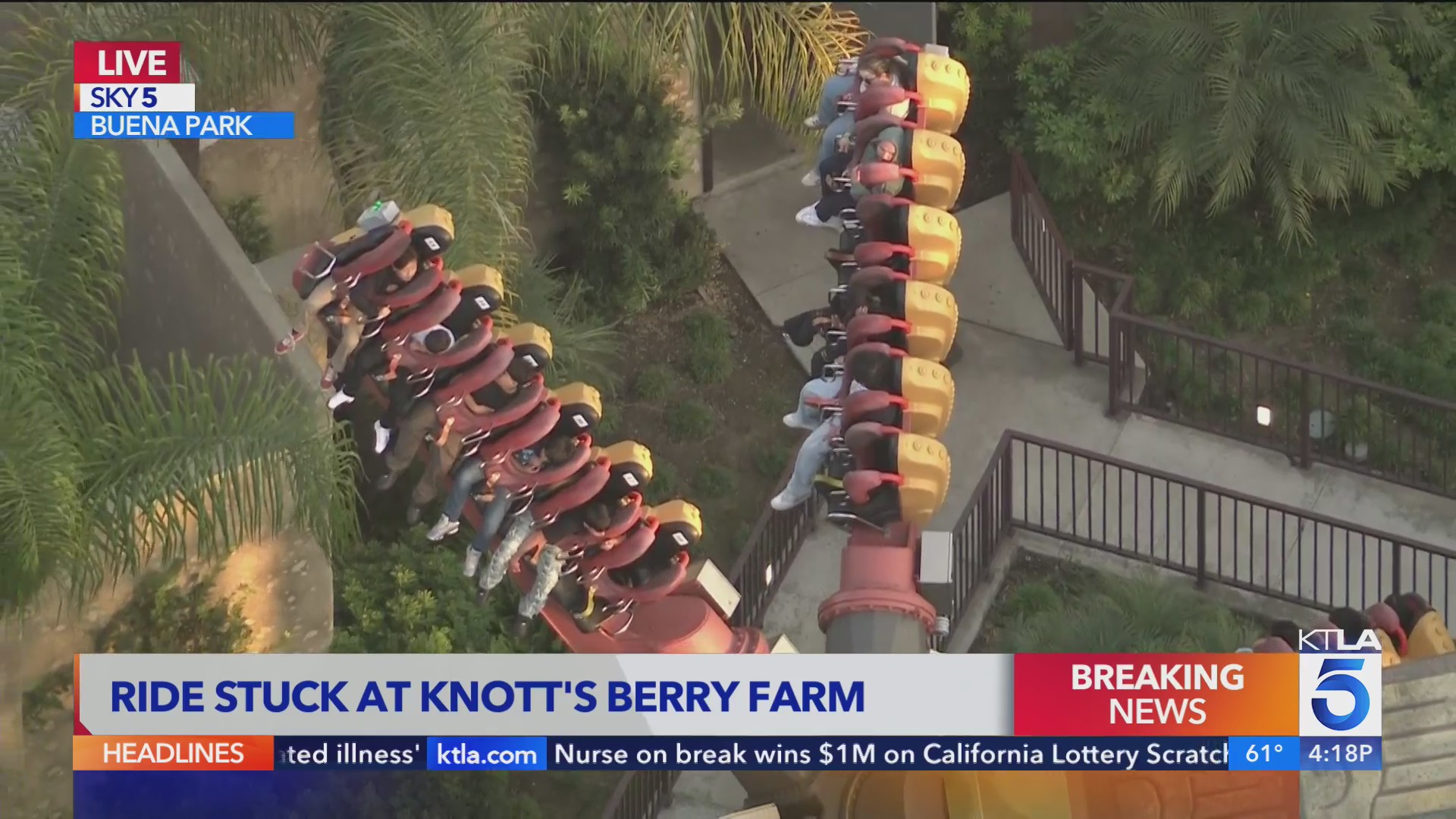 Live coverage: Riders stranded in mid-air after ride malfunctions at ...