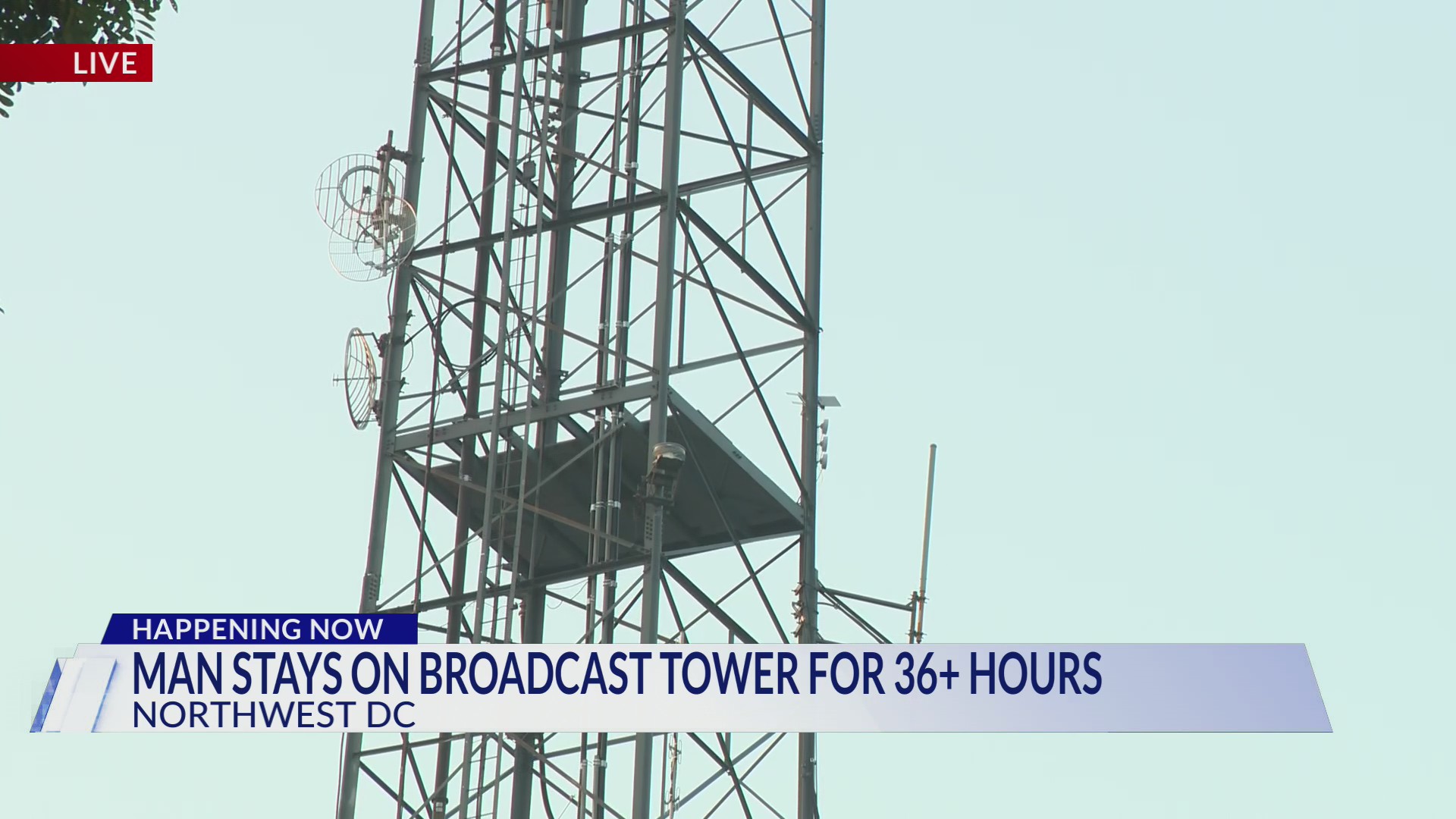 Standstill continues for man standing on broadcast tower at American ...