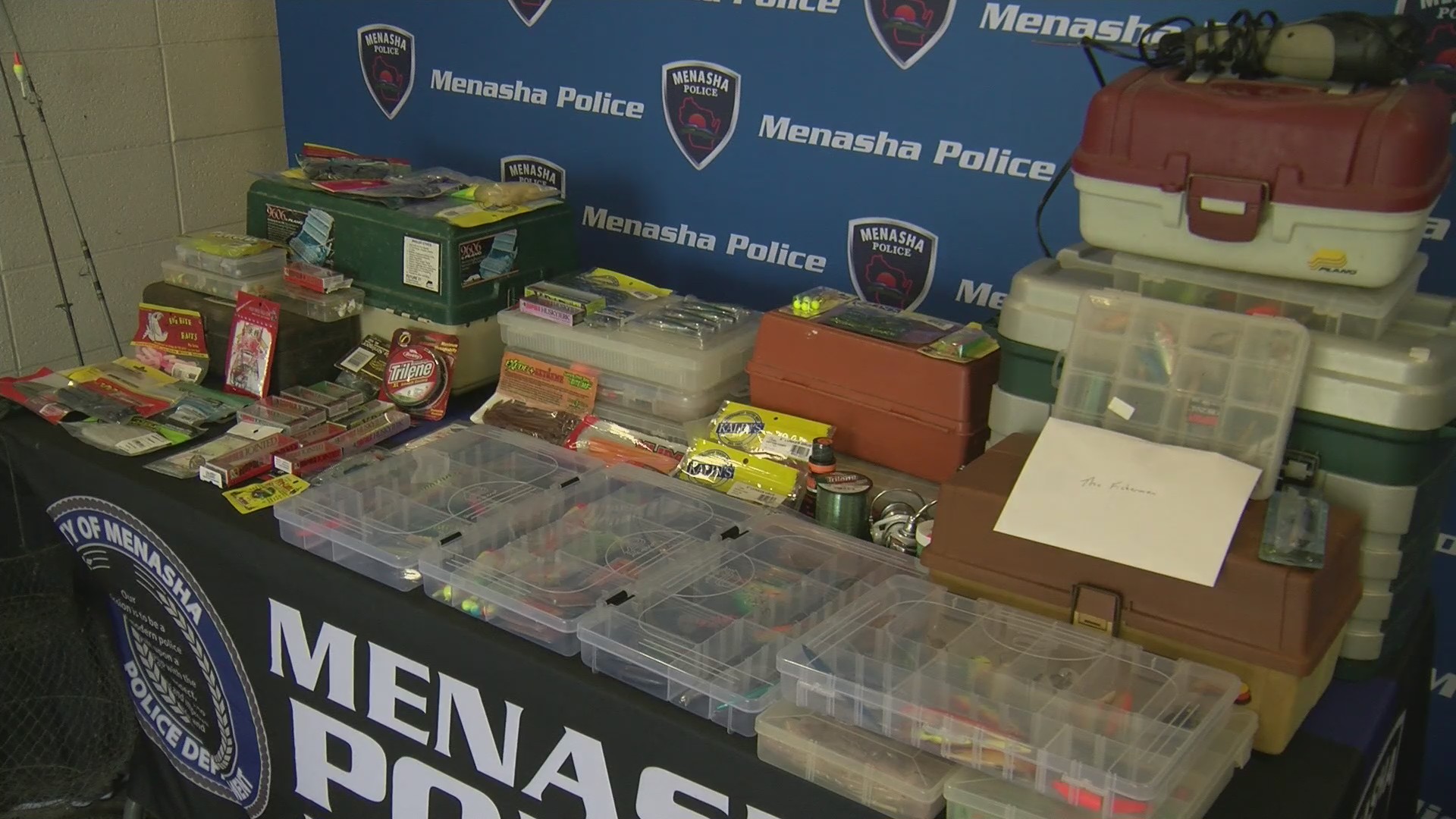 Menasha community & police officers donate new fishing gear to victims ...