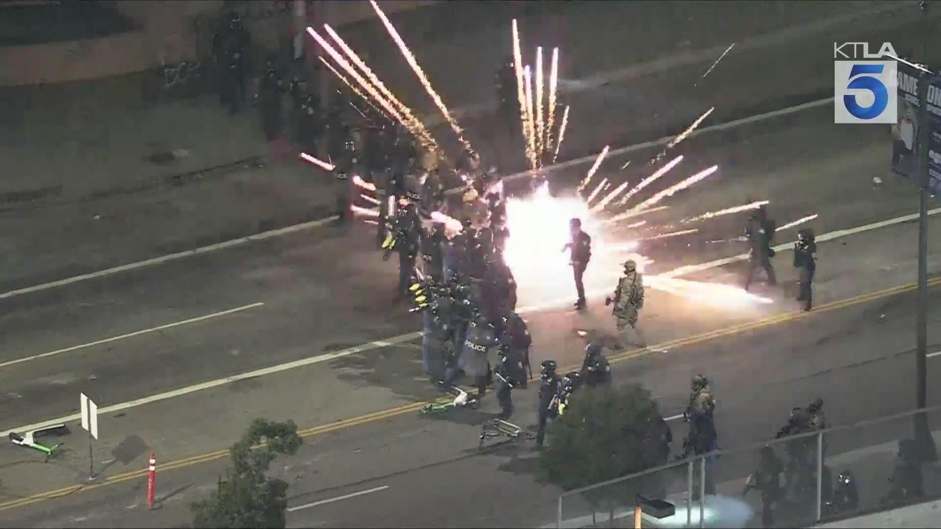 Federal officers create skirmish line as protestors gather in downtown ...