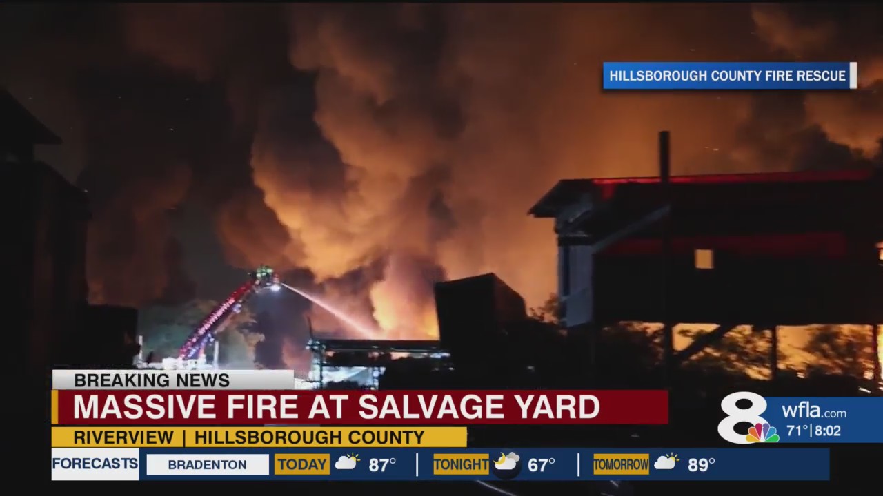 Massive fire breaks out at salvage yard in Hillsborough County – WFLA