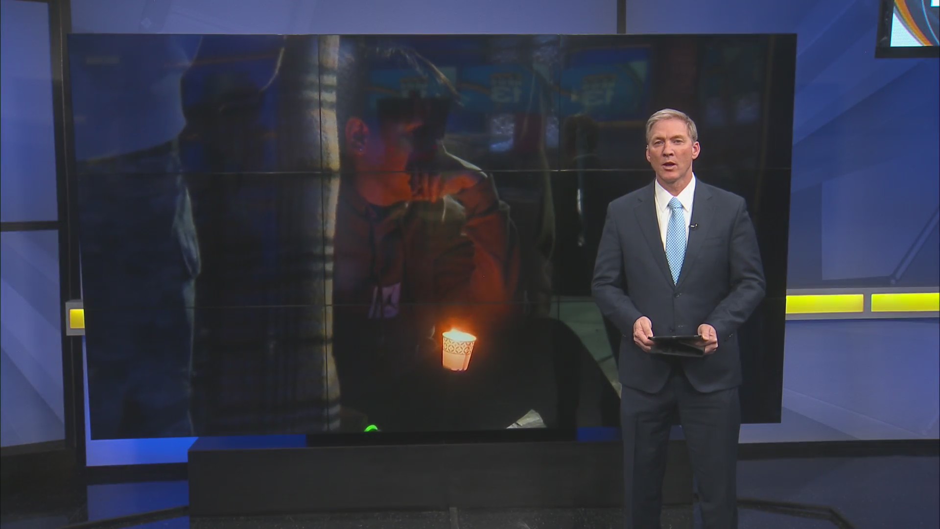 Candlelight vigil honors ‘Por Vida’ tattoo shop owner John ‘Bale ...