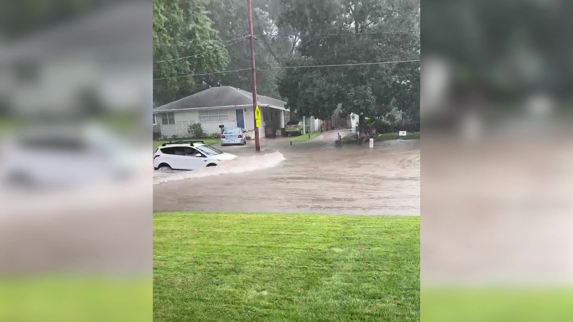 WATCH: Driver dares to pass flooded street in West Des Moines, likely ...