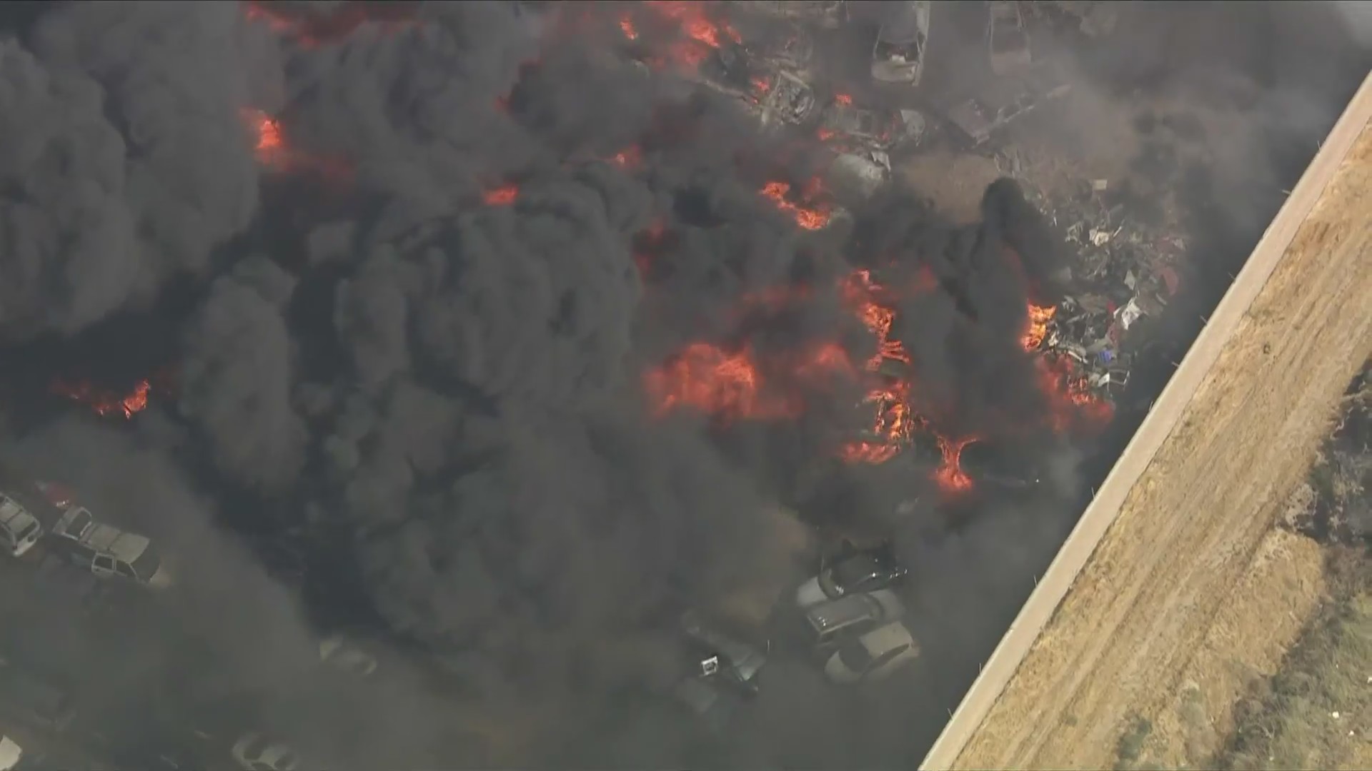 Crews battle massive junkyard fire in Lancaster – KTLA