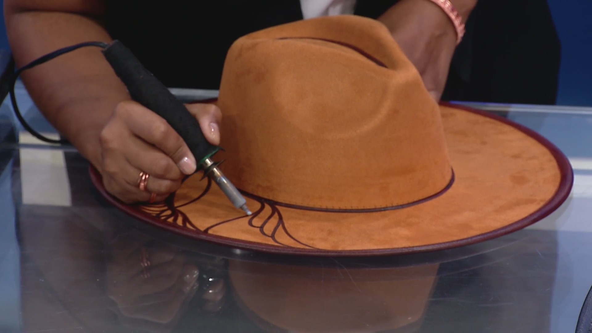 Custom fedoras, just one of 160 booths at the 2025 River Arts Festival ...