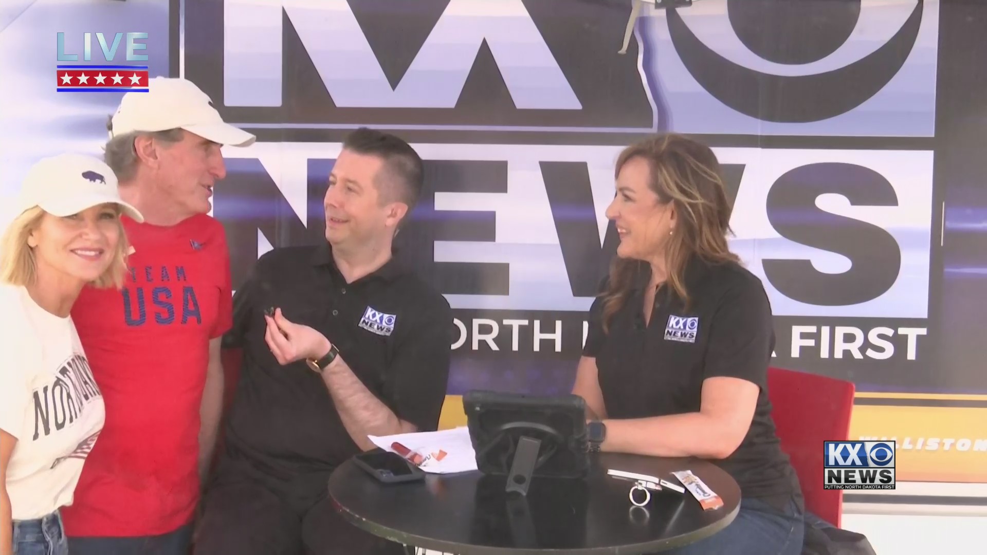 Gov. Burgum & First Lady Speak with Nicholas Quallich & Alysia Huck at Mandan Independence Day ...