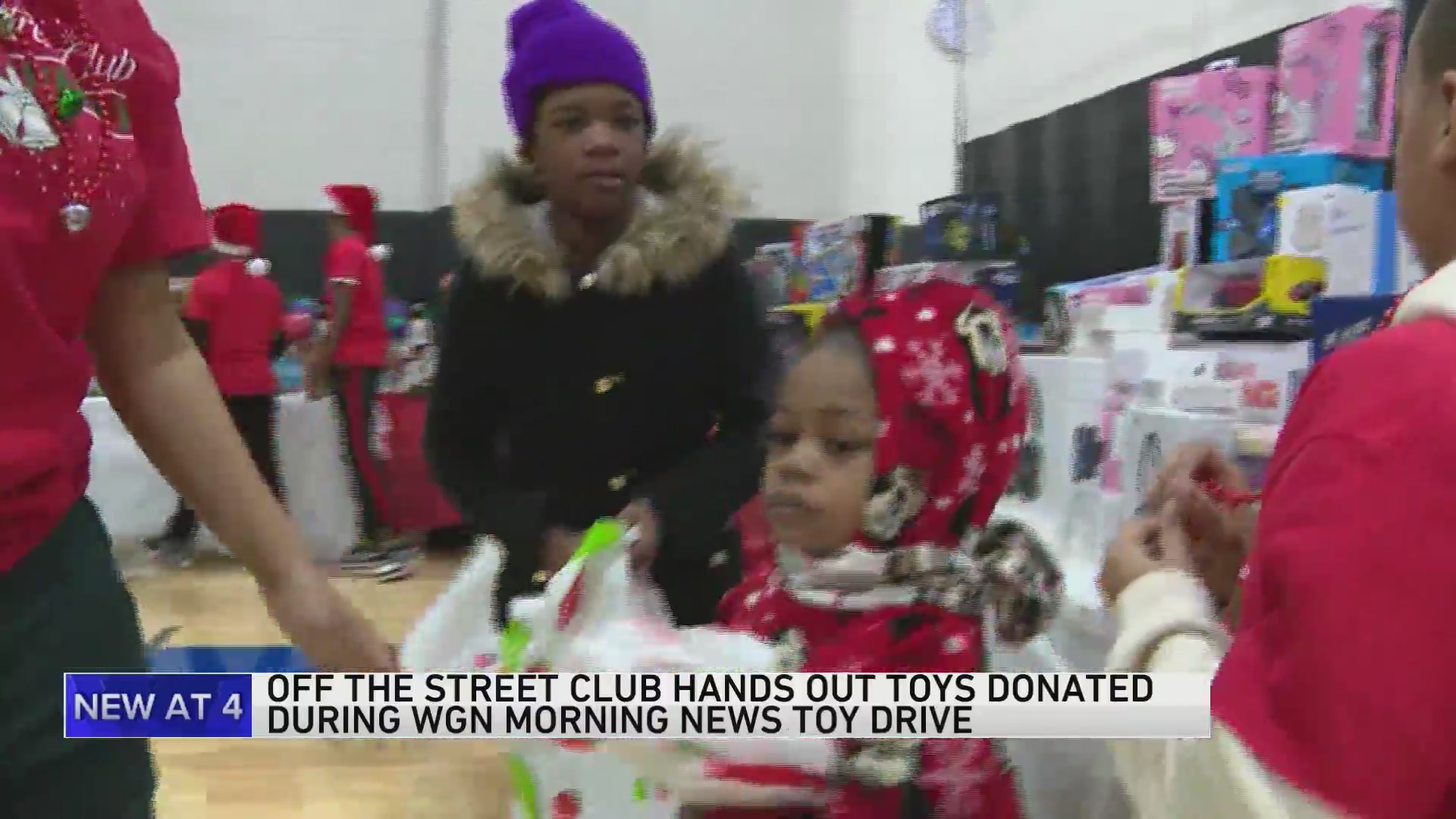 Off the Street Club hands out toys donated during WGN Morning News Toy ...