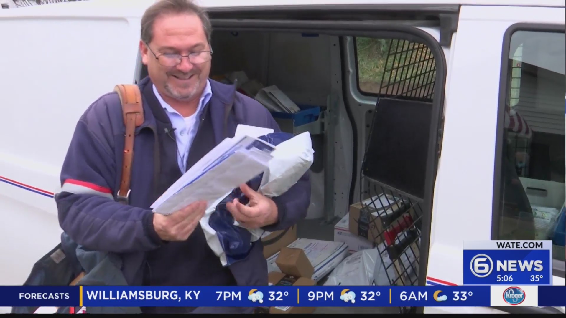 USPS carrier delivers holiday packages during busiest time of year ...