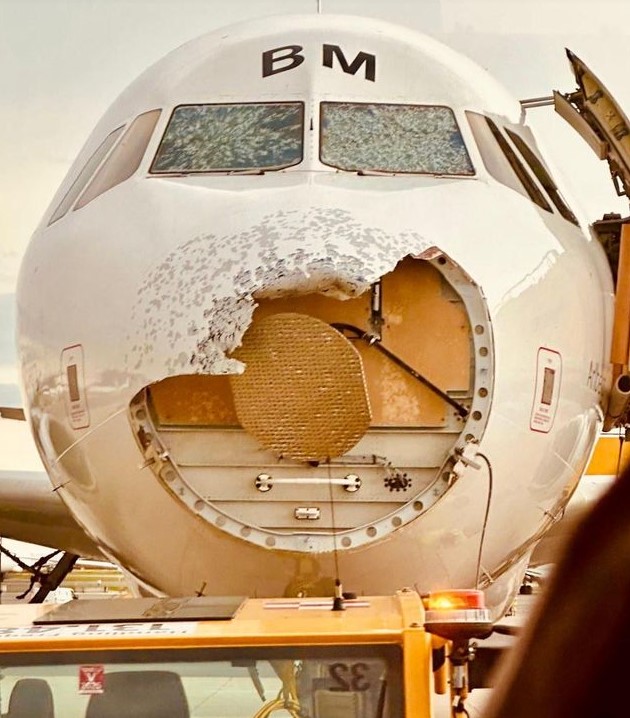 Hailstorm Causes Severe Damage to Nose and Cockpit of Austrian Airlines ... Hailstorm Causes Severe Damage to Nose and Cockpit of Austrian Airlines ...